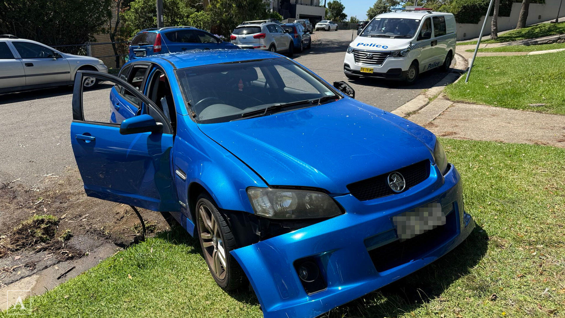 Two young children were caught in a car that careered down a driveway ...